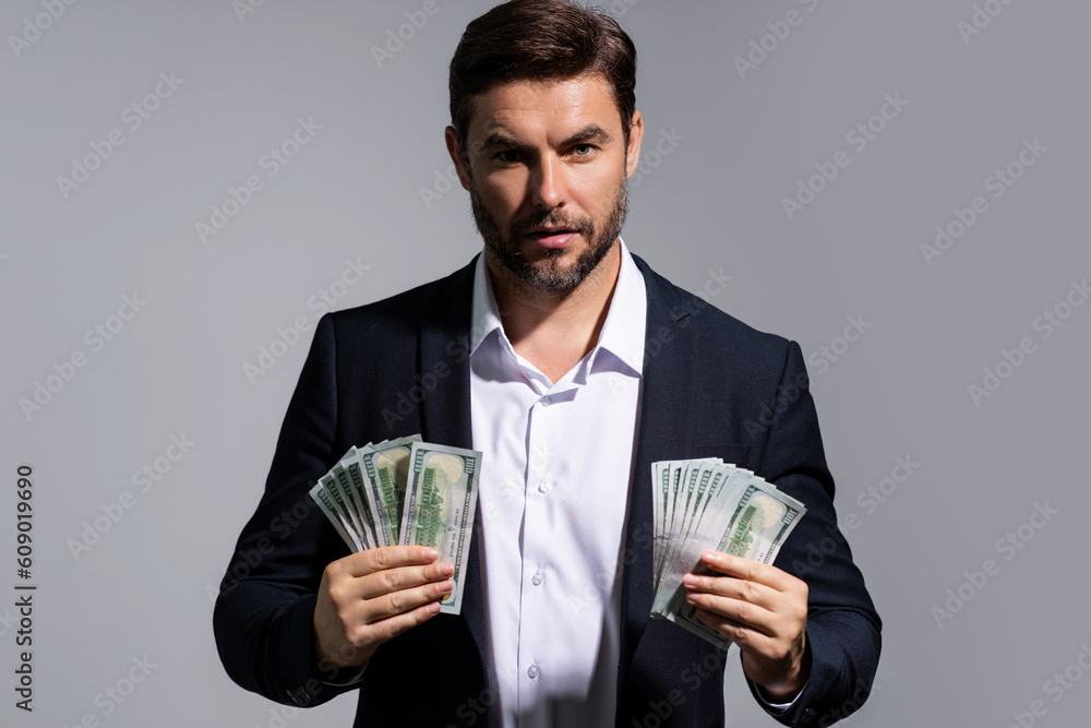 Successful business man counting money. Handsome middle age man holding ...