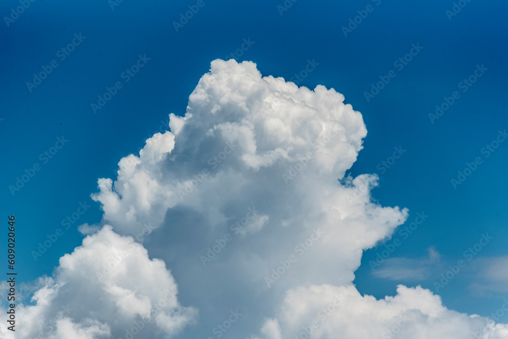 cumulus and cumulonimbus clouds, huge clouds that look like cotton in a ...