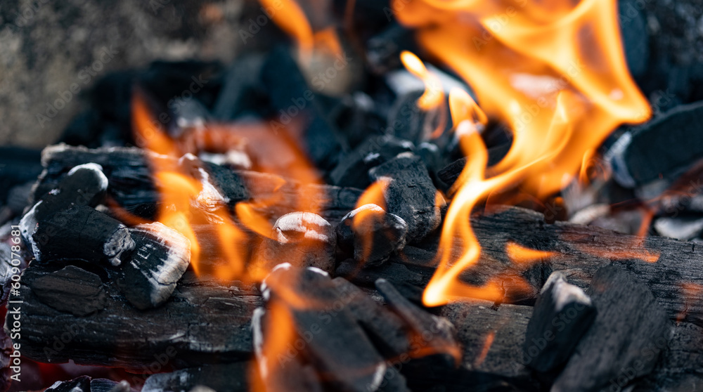 Fire, ember of charcoal on a grill. Close-up of glowing charcoal and ...