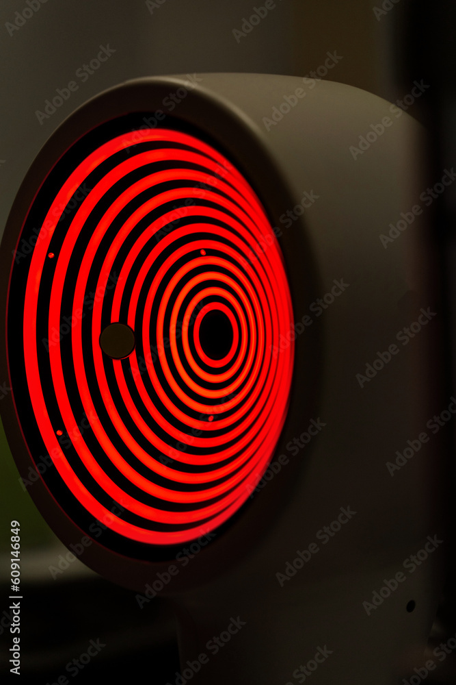 Corneal topographer shines red light for topography examination ...
