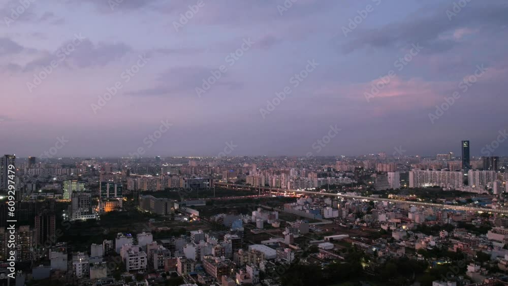 hyperlapse aerial timelapse shot moving over cityscape of gurgaon delhi ...