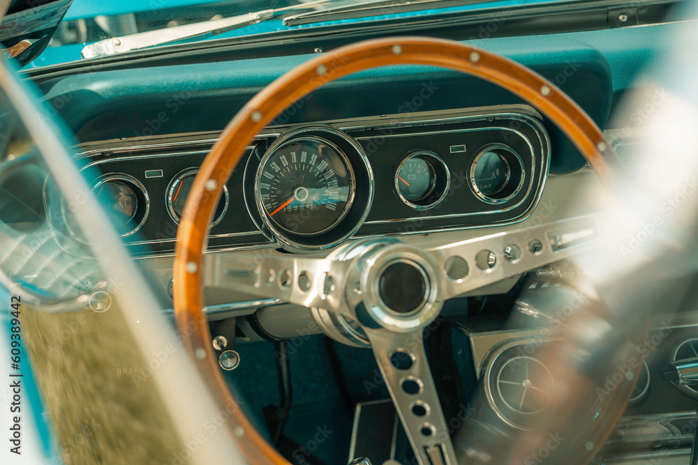 Steering wheel in a classic car, old automobile, vintage vehicle ...