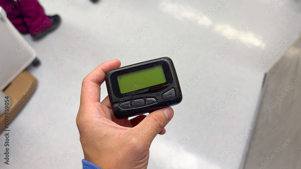 Beeper pager symbolizes communication, urgency, and efficiency in ...