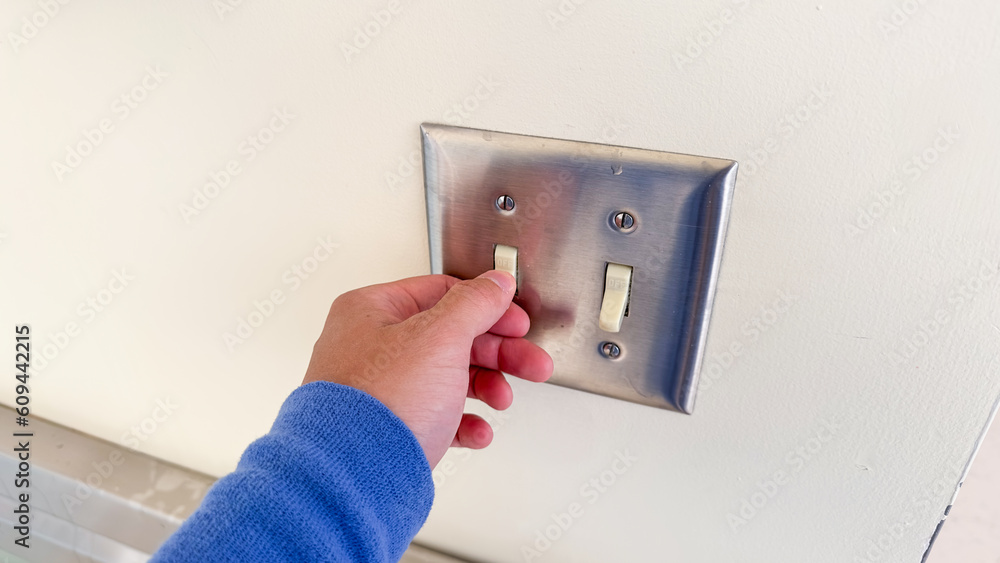 Light switch on and off symbolize control, illumination, and the power ...