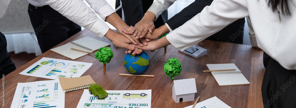 Group of business people put hand stack showing synergy of corporate ...