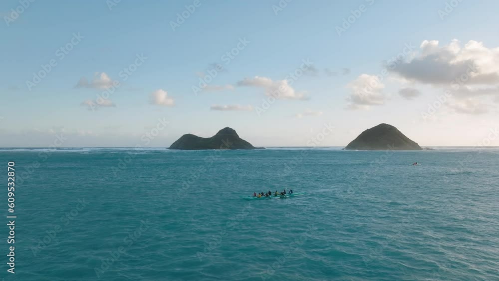 Vidéo Stock Hawaiian outrigger canoes sailing at scenic Na Mokulua ...