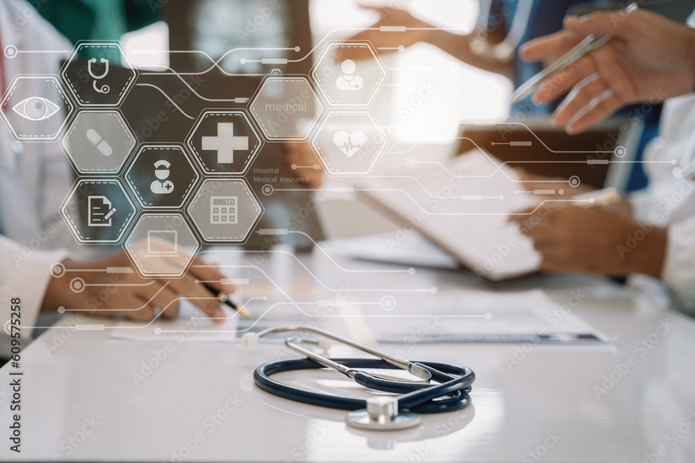 Foto de Close up of a stethoscope and digital tablet with virtual ...