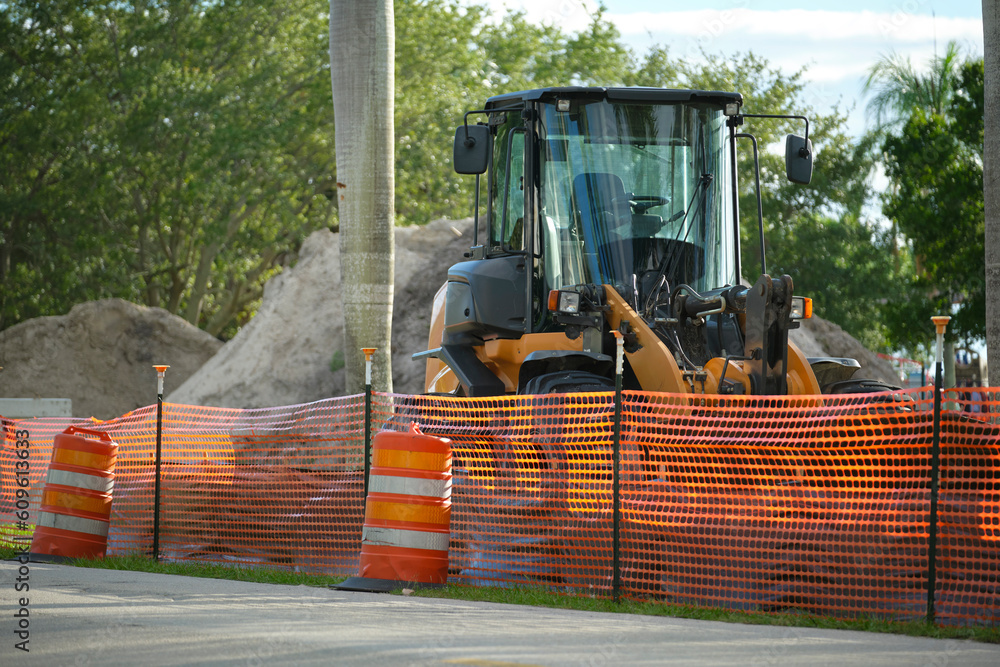 Protective restriction barrier at industrial construction site. Safety ...