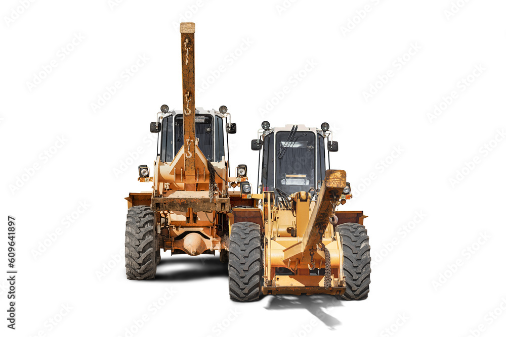 Two powerful wheeled front loaders for transporting bulky goods on a ...
