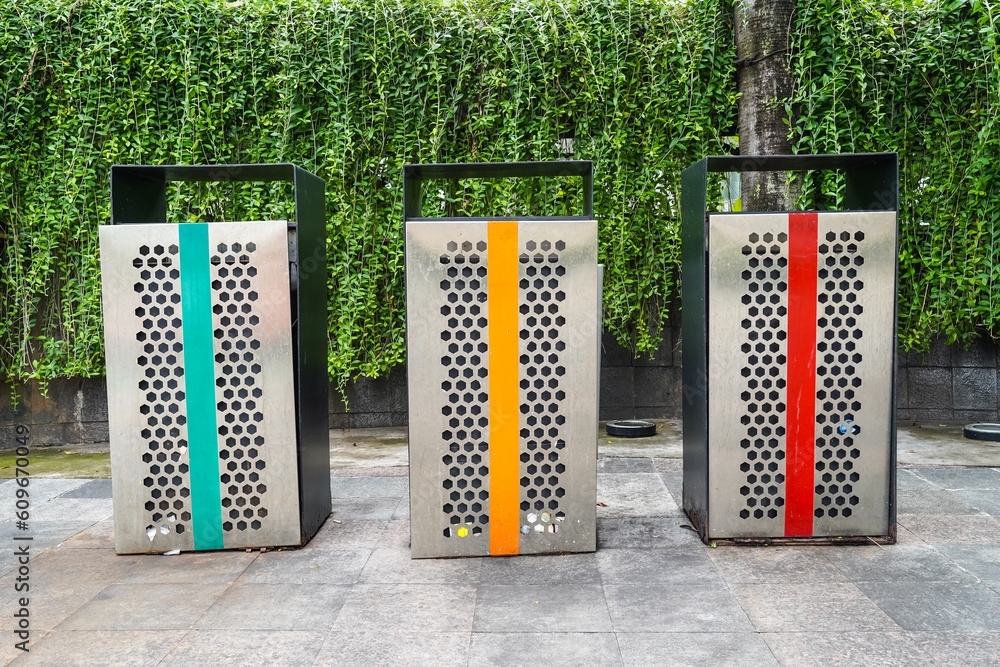 Modern multi colored dustbin for collecting recyclables, compost and ...