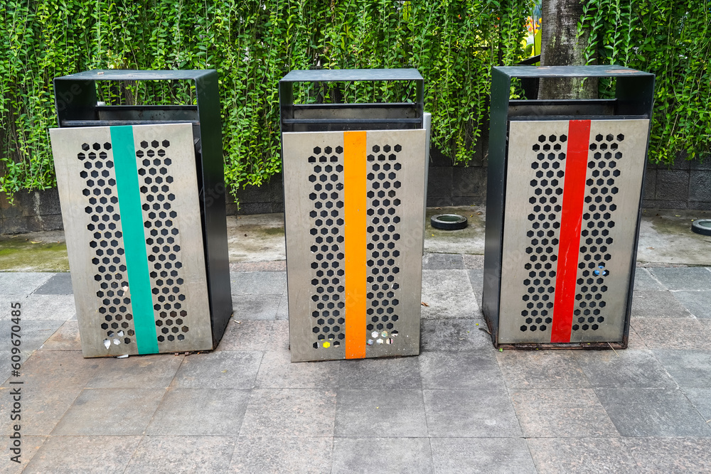 Modern multi colored dustbin for collecting recyclables, compost and ...