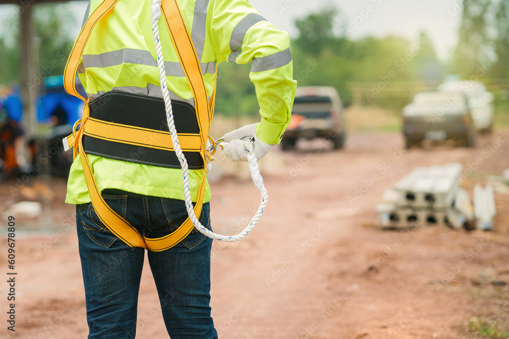construction inspector engineer making clothes to go up to see the work ...