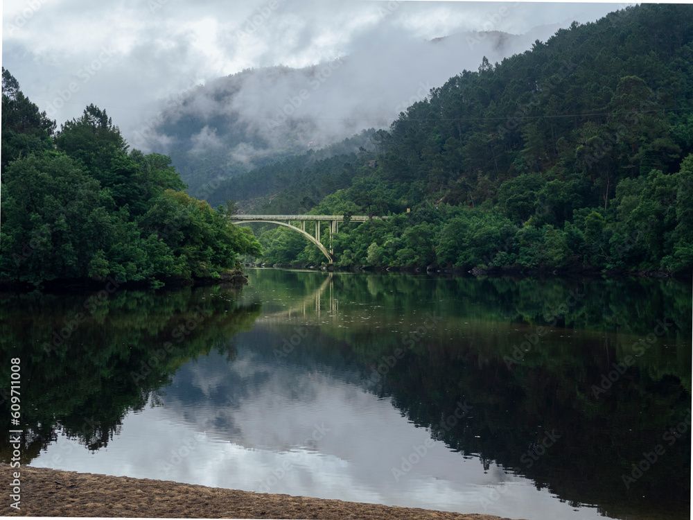 Fluvial landscape in Ribadavia Orense, with the green mountains and the ...