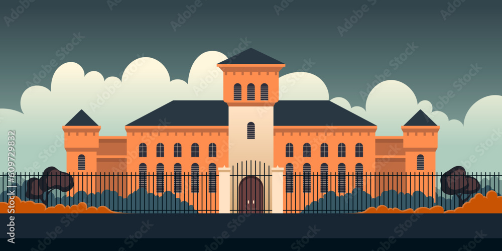 Prison building surrounded by high fence exterior. Architecture outdoor ...