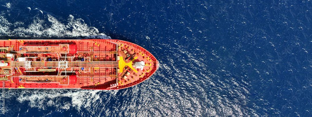 Aerial drone ultra wide photo of small oil - chemical tanker cruising ...