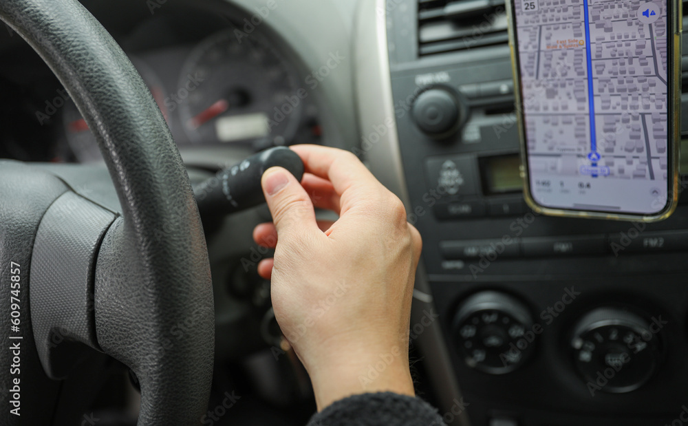 Car driving handle with hand: a symbol of control, independence ...