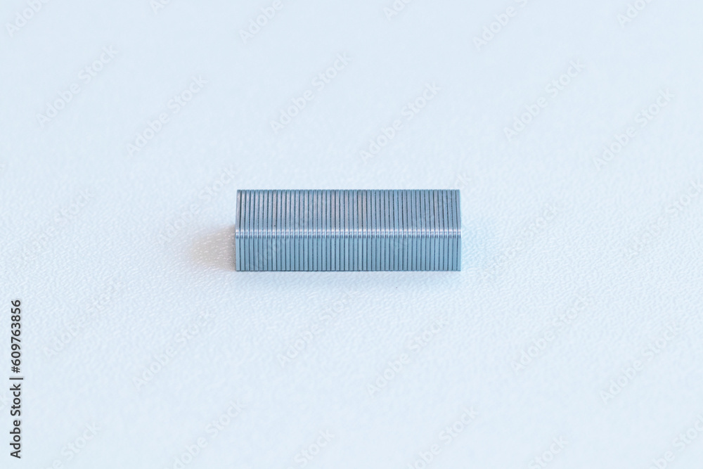 Metal staples (stapler) small on a white background. Used for joining ...