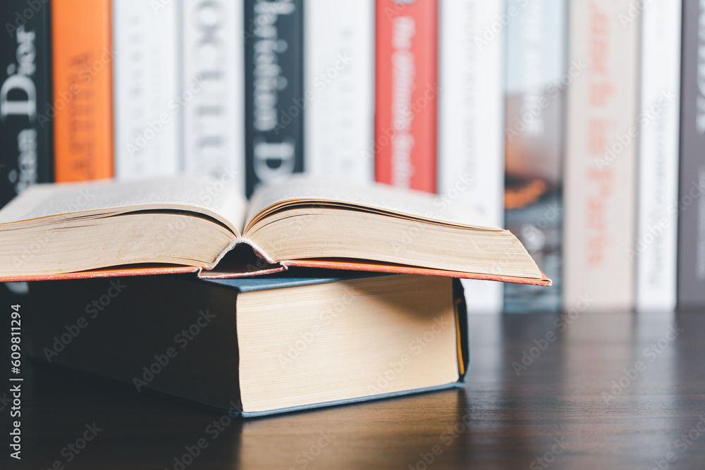 Book stack in the library room and blurred stack book for business and ...