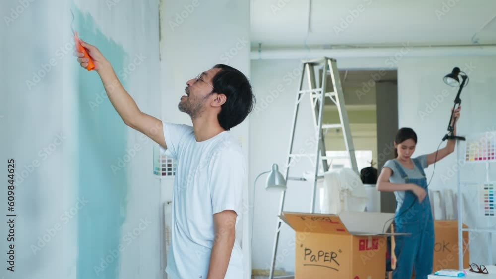 Peaceful Asian Cheerful couple young man and woman smiling sit together ...