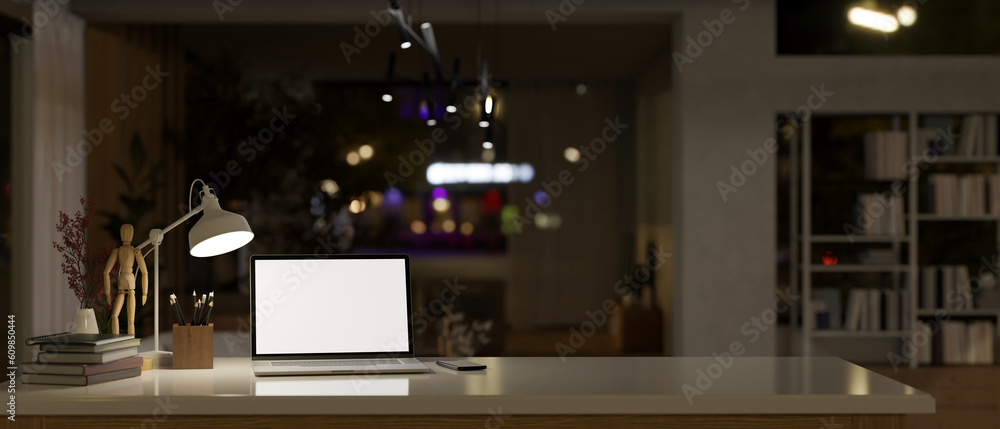 Modern office at night with laptop mockup on a tabletop. Stock ...