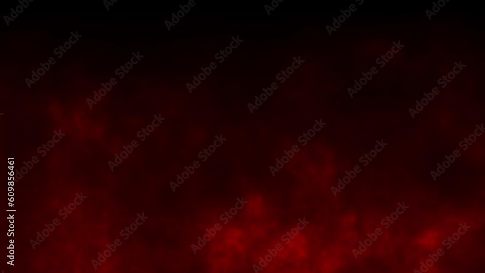 Dramatic red background with dark haze rising across the screen with ...