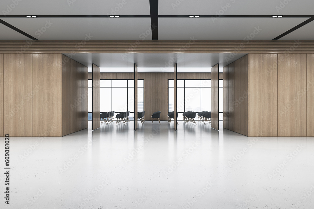 Side view on chair rows in sunlit conference hall with huge windows ...