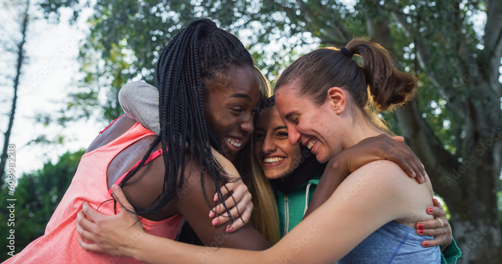 Portrait of Multiethnic Female Friends in Sports Clothes Hugging and ...