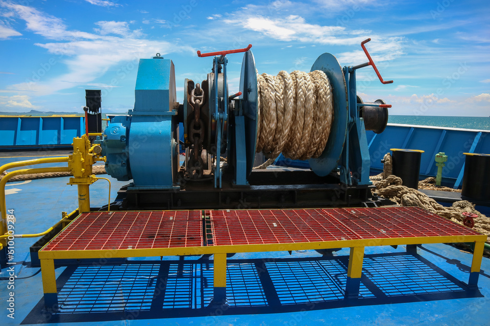 Mooring winch on a forward of a ferry with rope and chain in drum ...