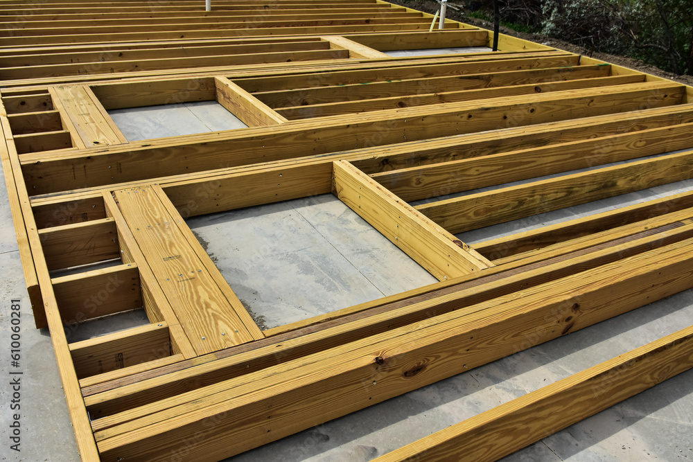 Wood framed exterior walls complete and ready to lift into place for ...