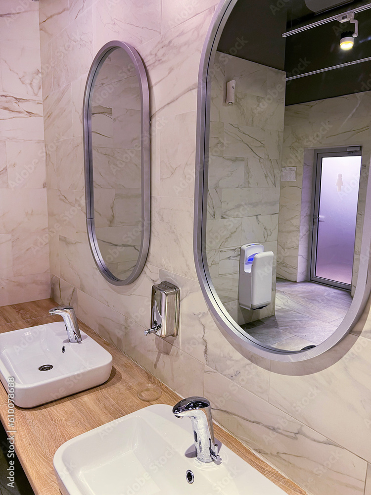 Modern restroom interior with stone gray tiles. Contemporary interior ...