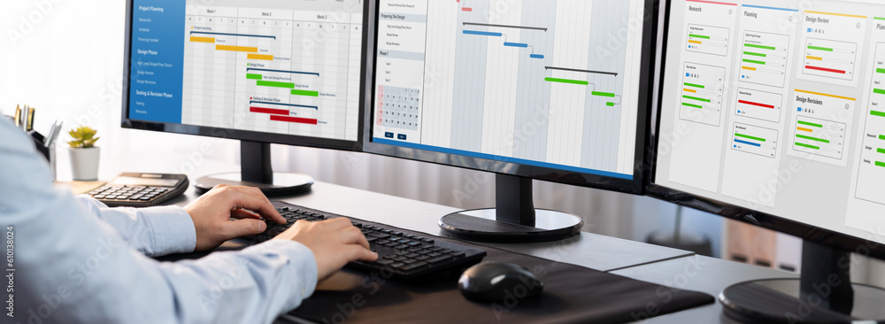 Project manager planning schedules for business task on office using ...