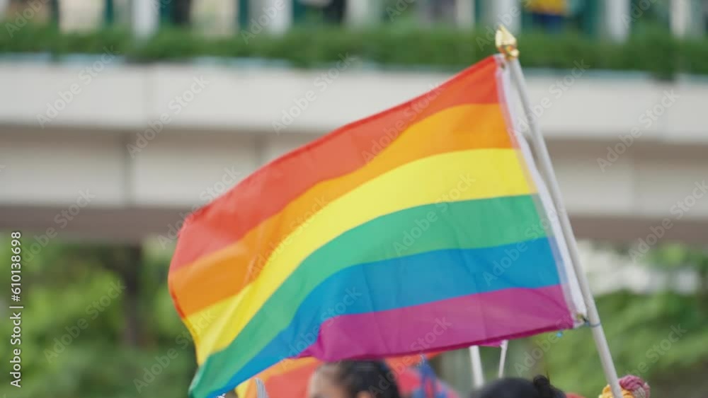 Wave LGBTQ gay pride flags for celebration. Colorful rainbow flag ...