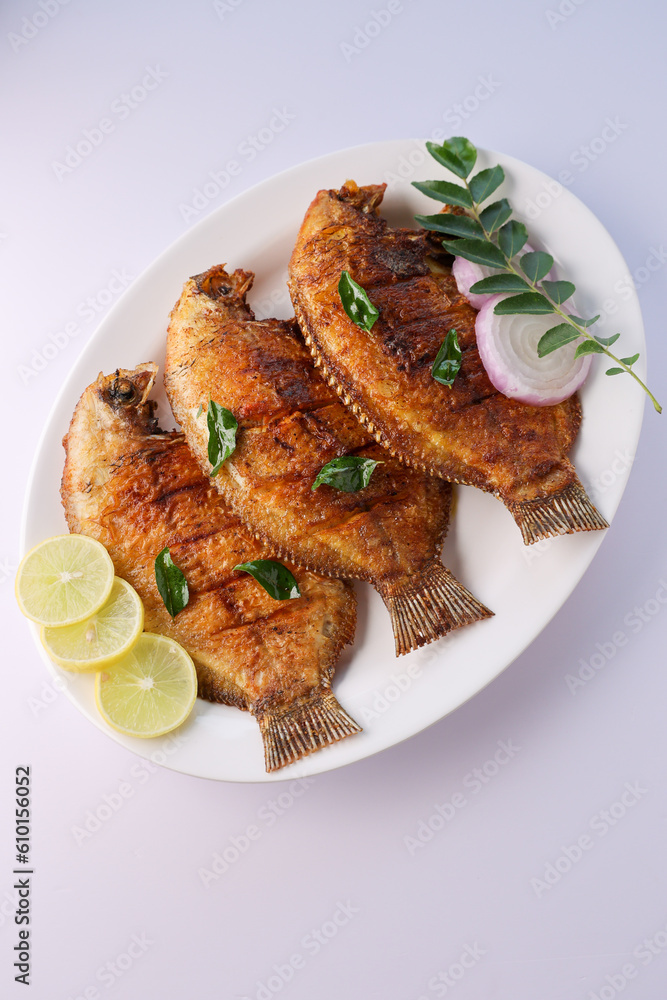Kerala fish curry Karimeen Pollichathu a popular hot and spicy baked ...