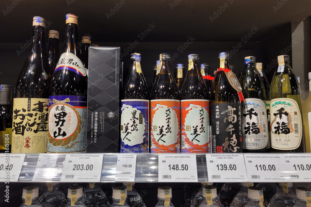 PENANG, MALAYSIA - 26 MAY 2023: An assortment of Japanese sake bottles ...