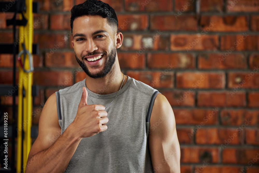 Fitness, thumbs up and portrait of man in gym, motivation and confident ...