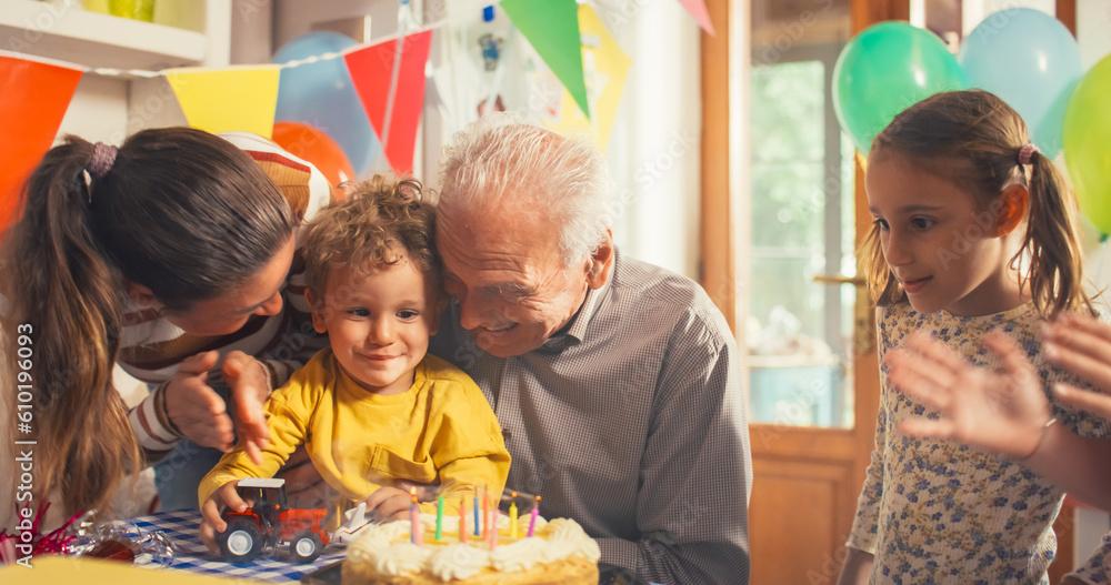 Portrait of a Small Family Gathering Around a Birthday Cake to Blow Out ...
