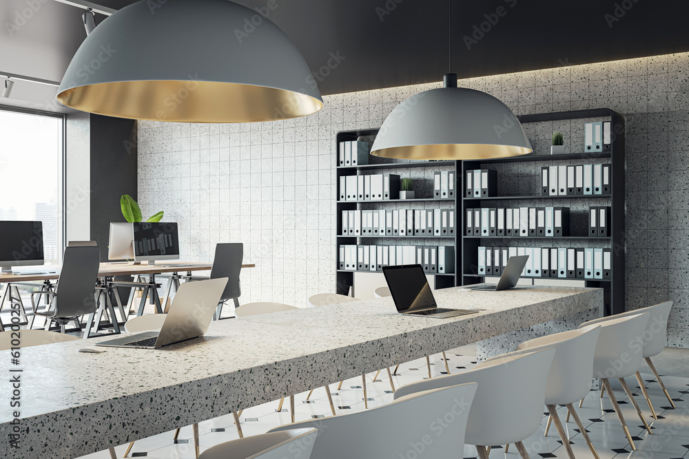 Perspective view of an open office with desks, computers, a concrete ...