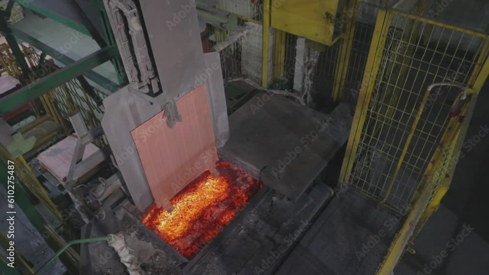 The process of melting copper in the furnace. The furnace with molten ...