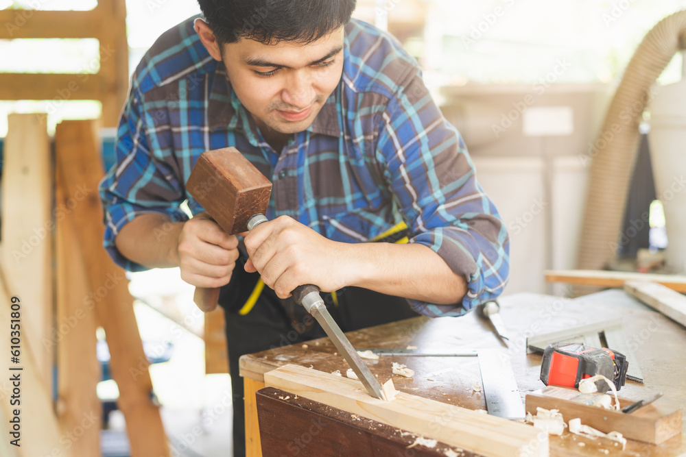 Carpentry professional, asian young man, male carpenter use machines or ...