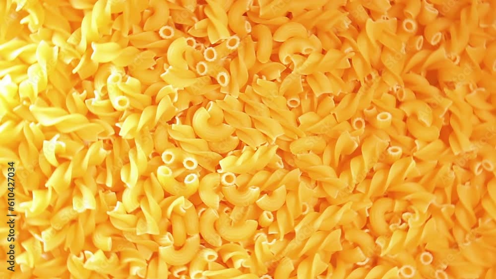 Uncooked Fusilli and Chifferi Rigati Pasta - Top View. Fat and ...