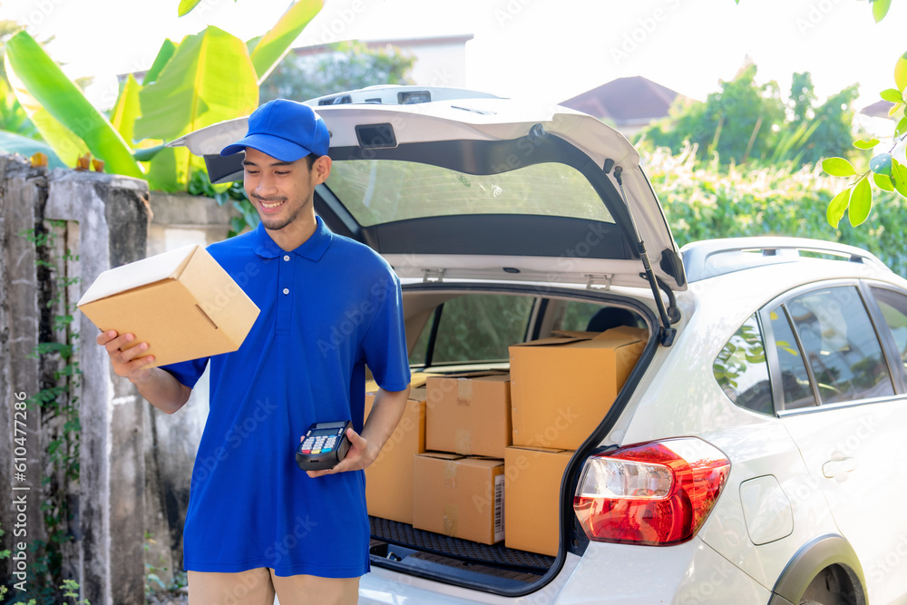 Parcel delivery staff deliver products to customers at the front of the ...