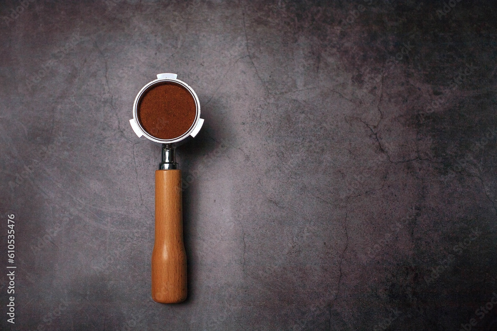 portafilter with ground coffee for espresso coffee maker on loft ...