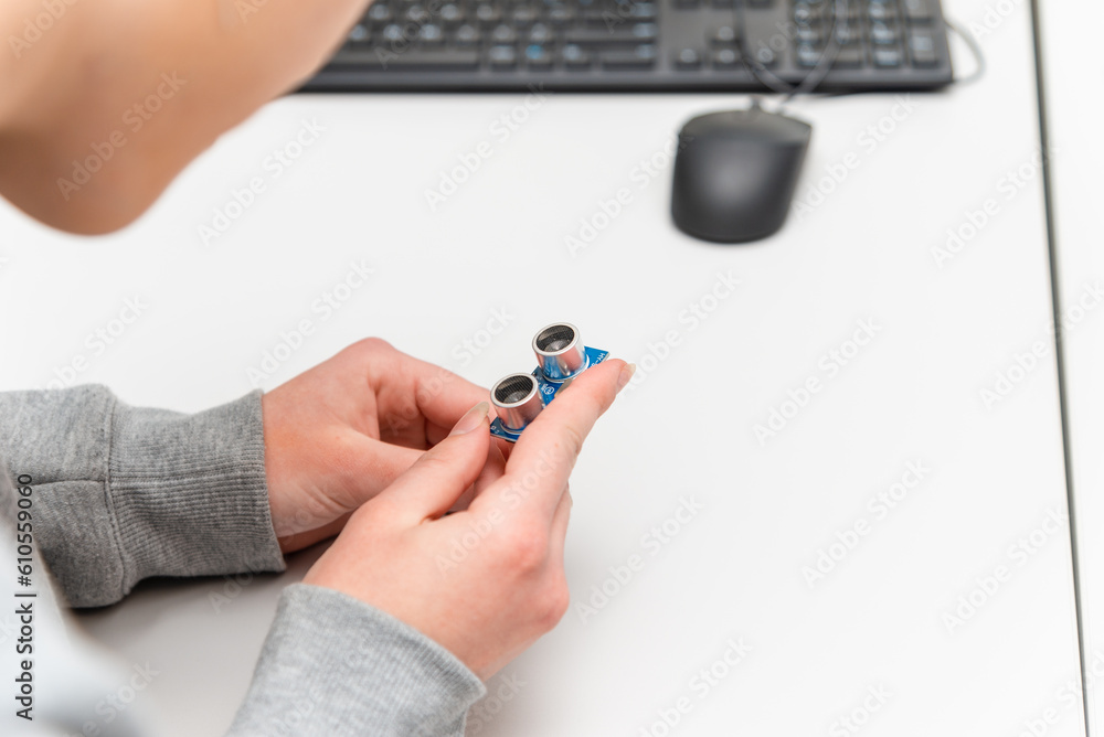 Student girl Learning To Program Robot Ultrasonic distance sensors ...