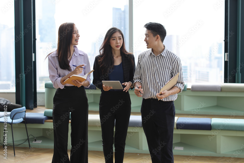 Collaborative process of young asian business people team working ...