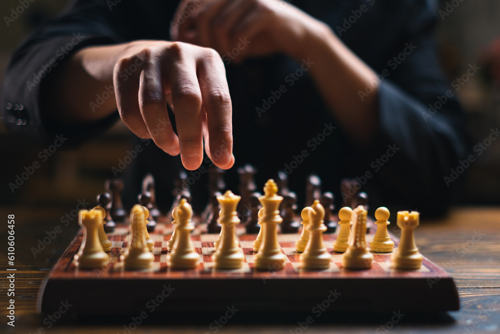 Hand playing a chess board game. Concept of business strategy, planning ...