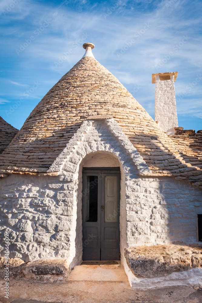 Trullo house with the conical roof made of limestone slabs, Alberobello ...