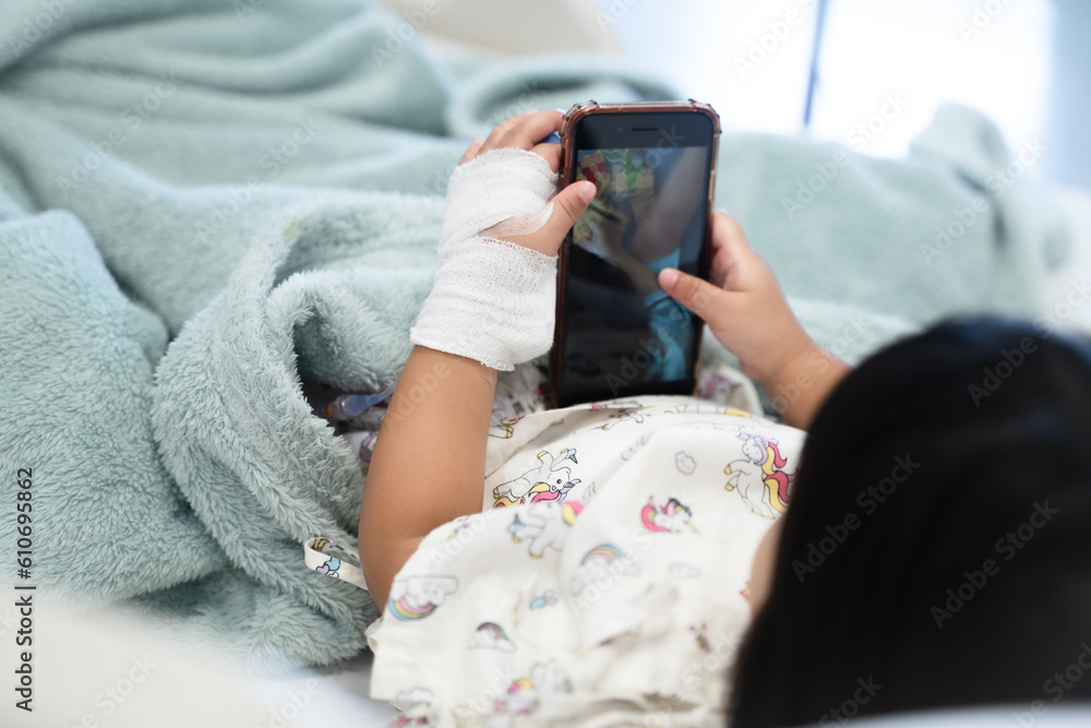 child is receiving medication through intravenous fluid therapy in ...