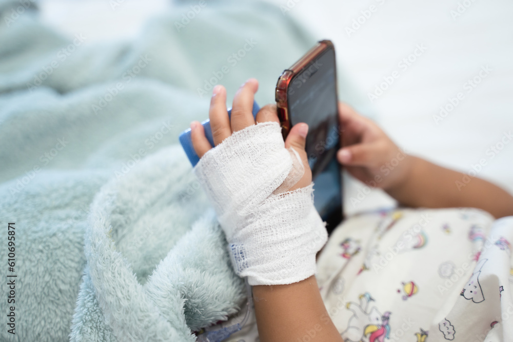child is receiving medication through intravenous fluid therapy in ...