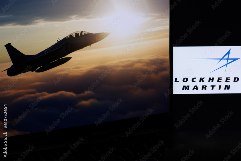 Lockheed Martin Corporation logo is seen on a mobile phone, blurred F ...