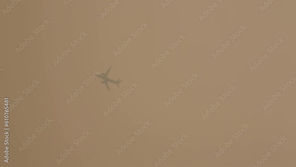 airplane flies through thick fog in new york city (smog and pollution ...